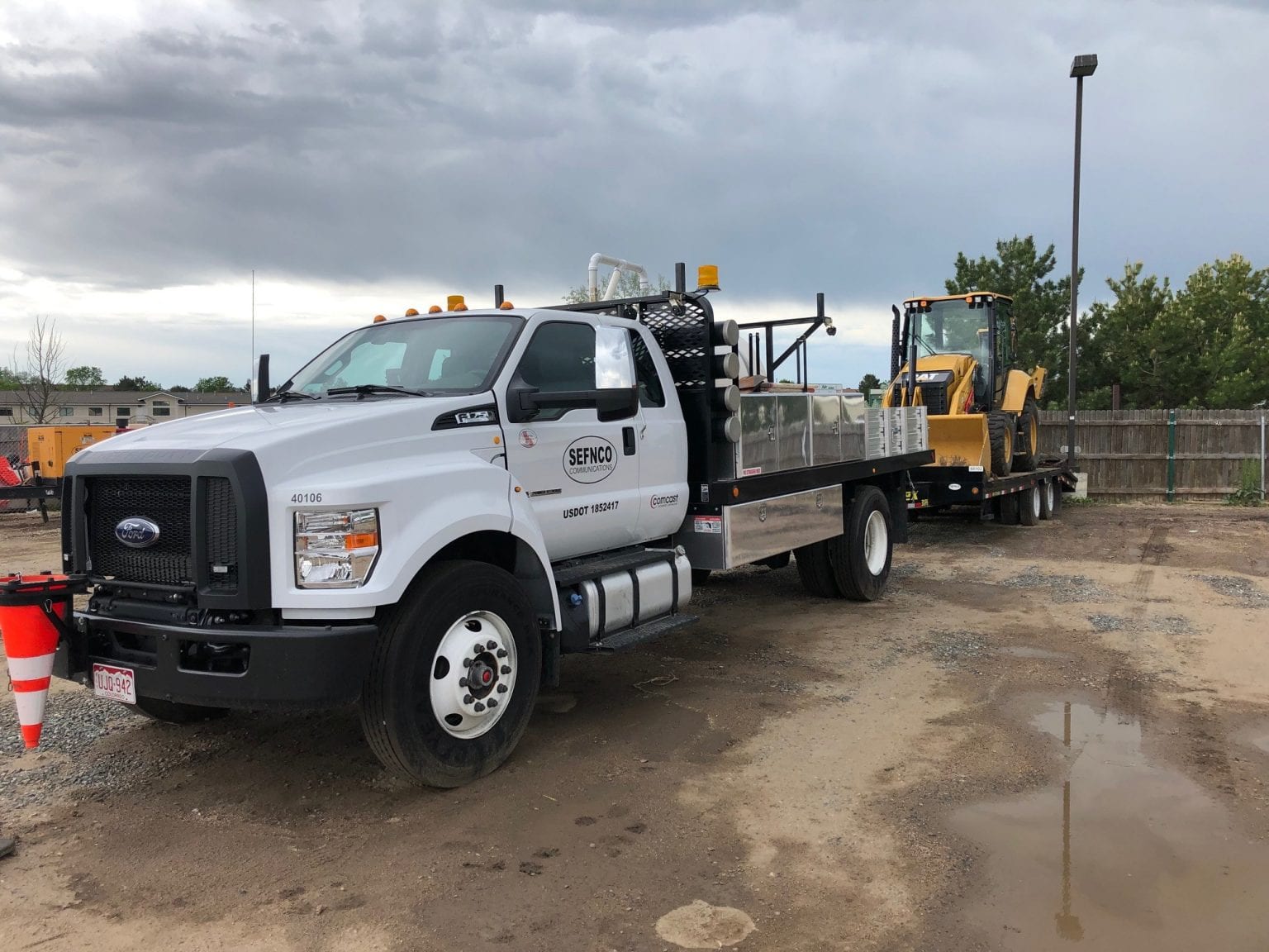 Truck With Trailer Hoe | Comcast Colorado